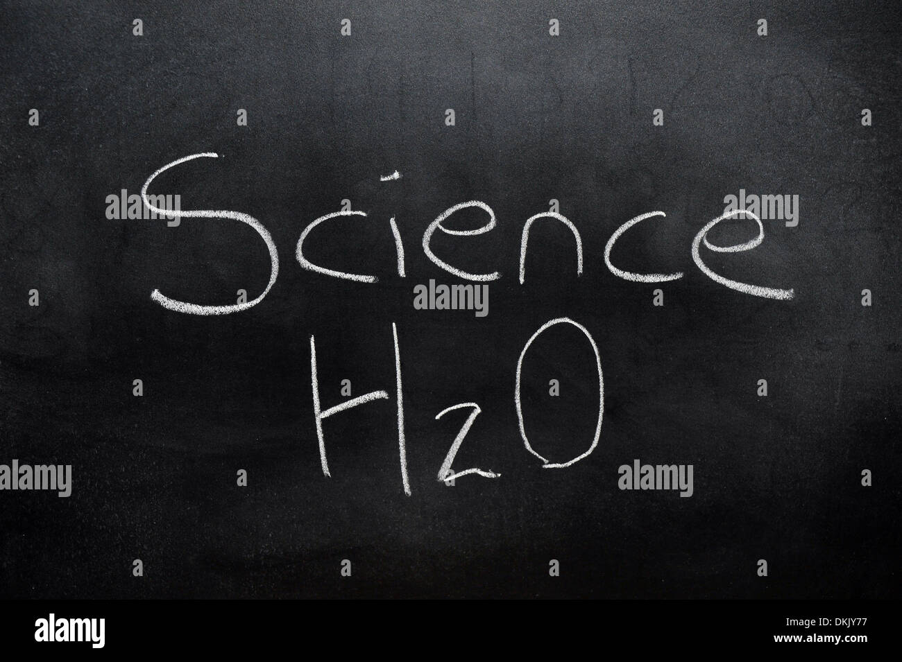 A blackboard with the words Science and H2O written on it in white ...