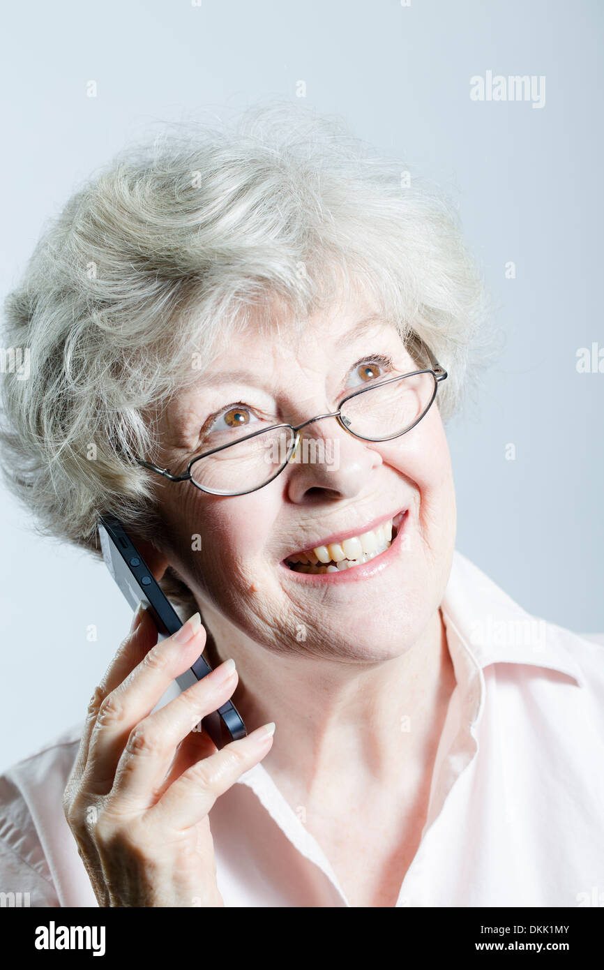 Grandmother on cellphone hi-res stock photography and images - Alamy
