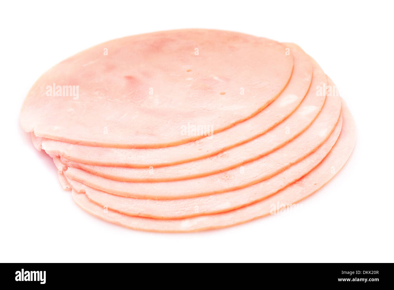Round ham slices isolated on white background Stock Photo - Alamy