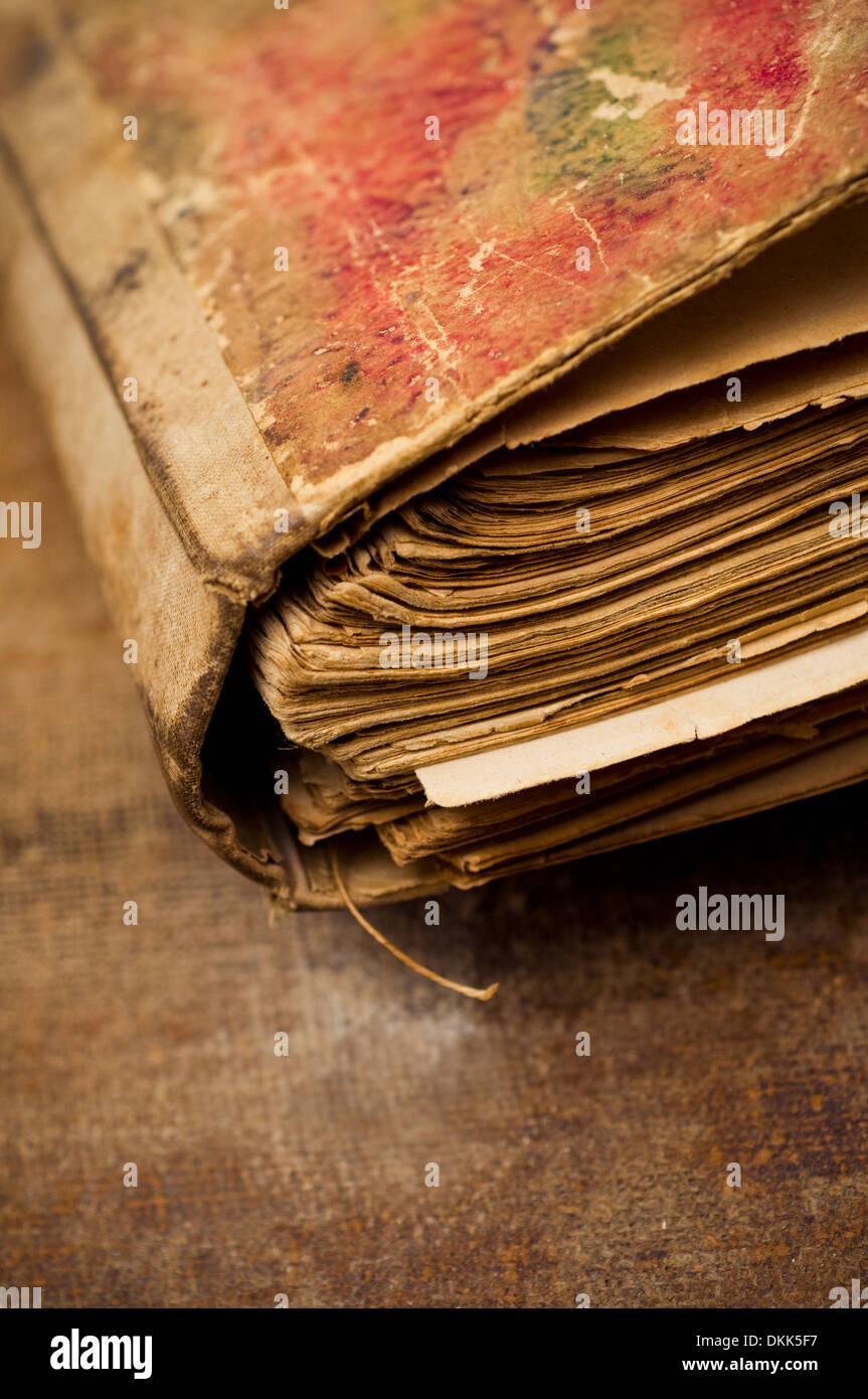 Very old stained hardcover book Stock Photo - Alamy