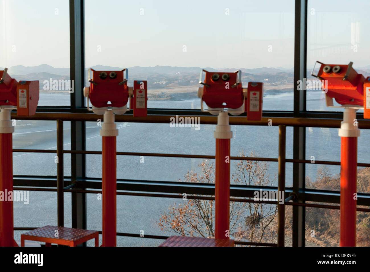 Coin operated binoculars point toward North Korea, over the Imjin river ...