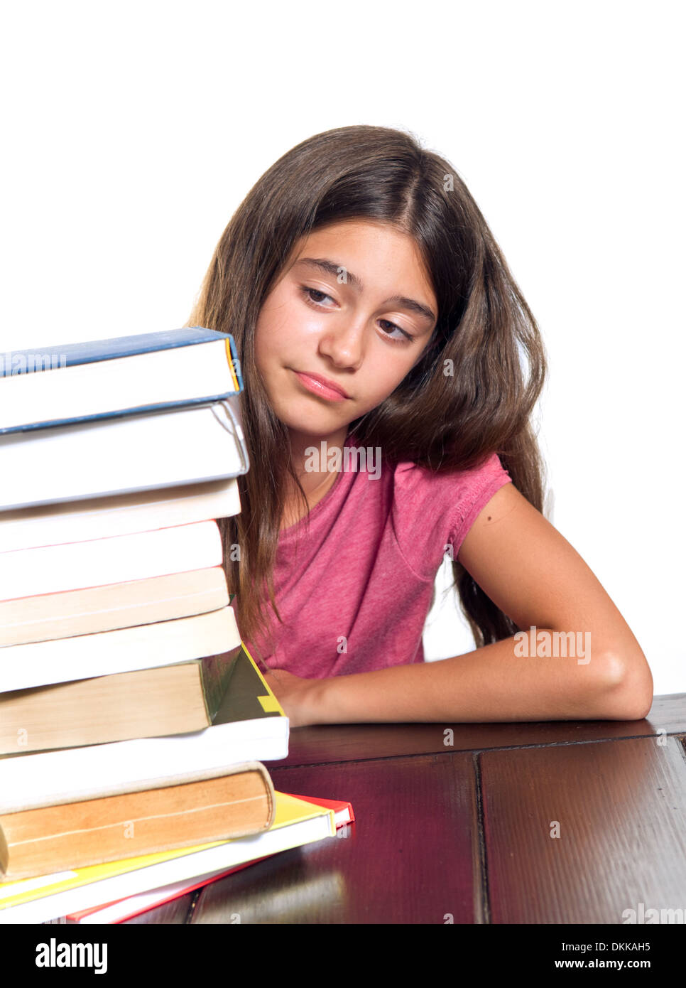 Sad schoolgirl with learning difficulties. Isolated on white background ...