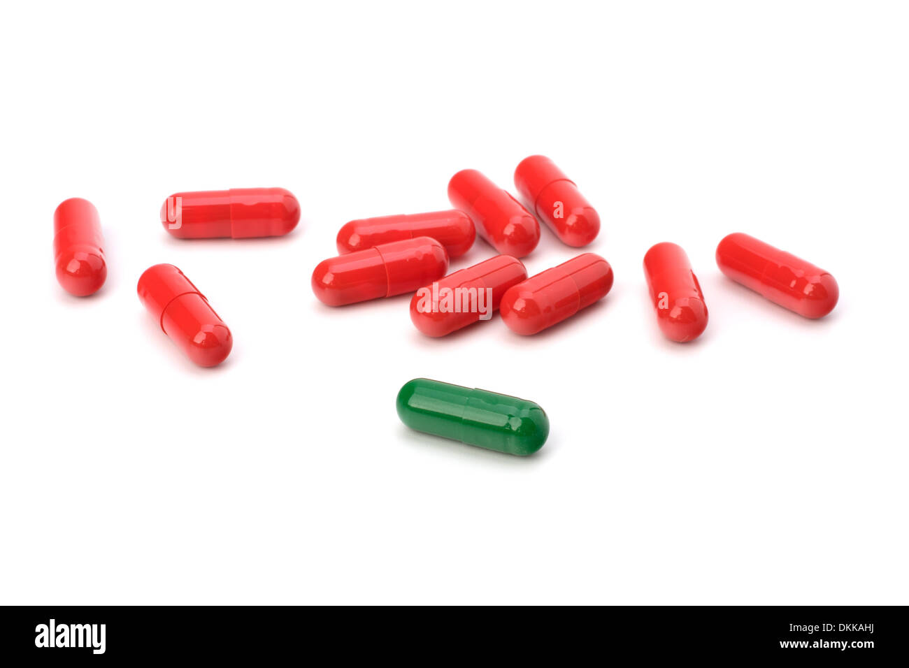 red capsules isolated on white background Stock Photo - Alamy