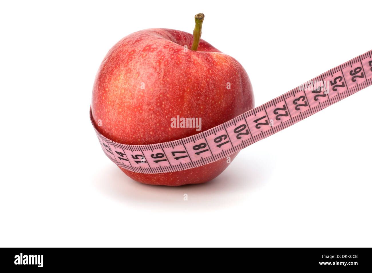 Apple with tape measure isolated on white background. Healthy lifestyle ...