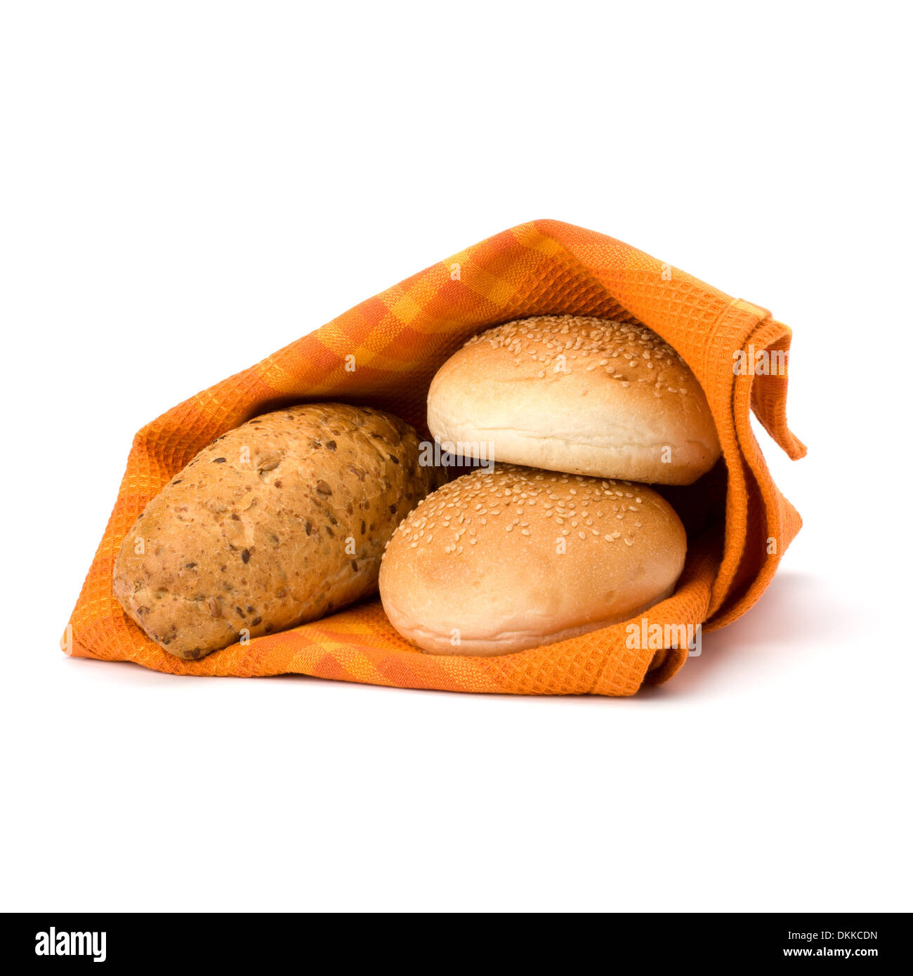 Fresh warm bread over kitchen towel isolated on white background Stock ...