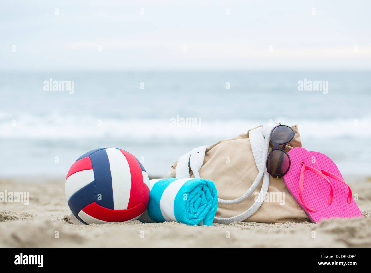 Beach gear in the sand Stock Photo - Alamy