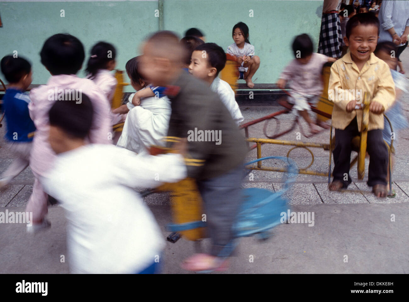 Kids playing after school in a kindergarten in Fenghuang, Hunan ...