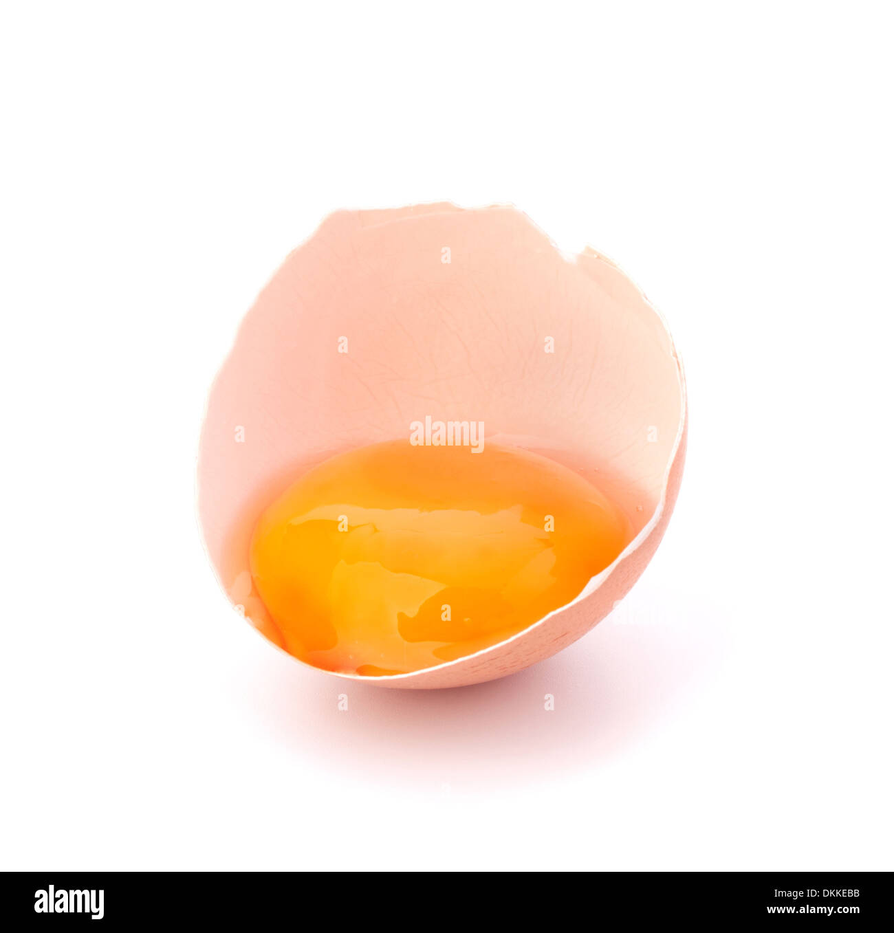 Broken egg isolated on white background Stock Photo - Alamy