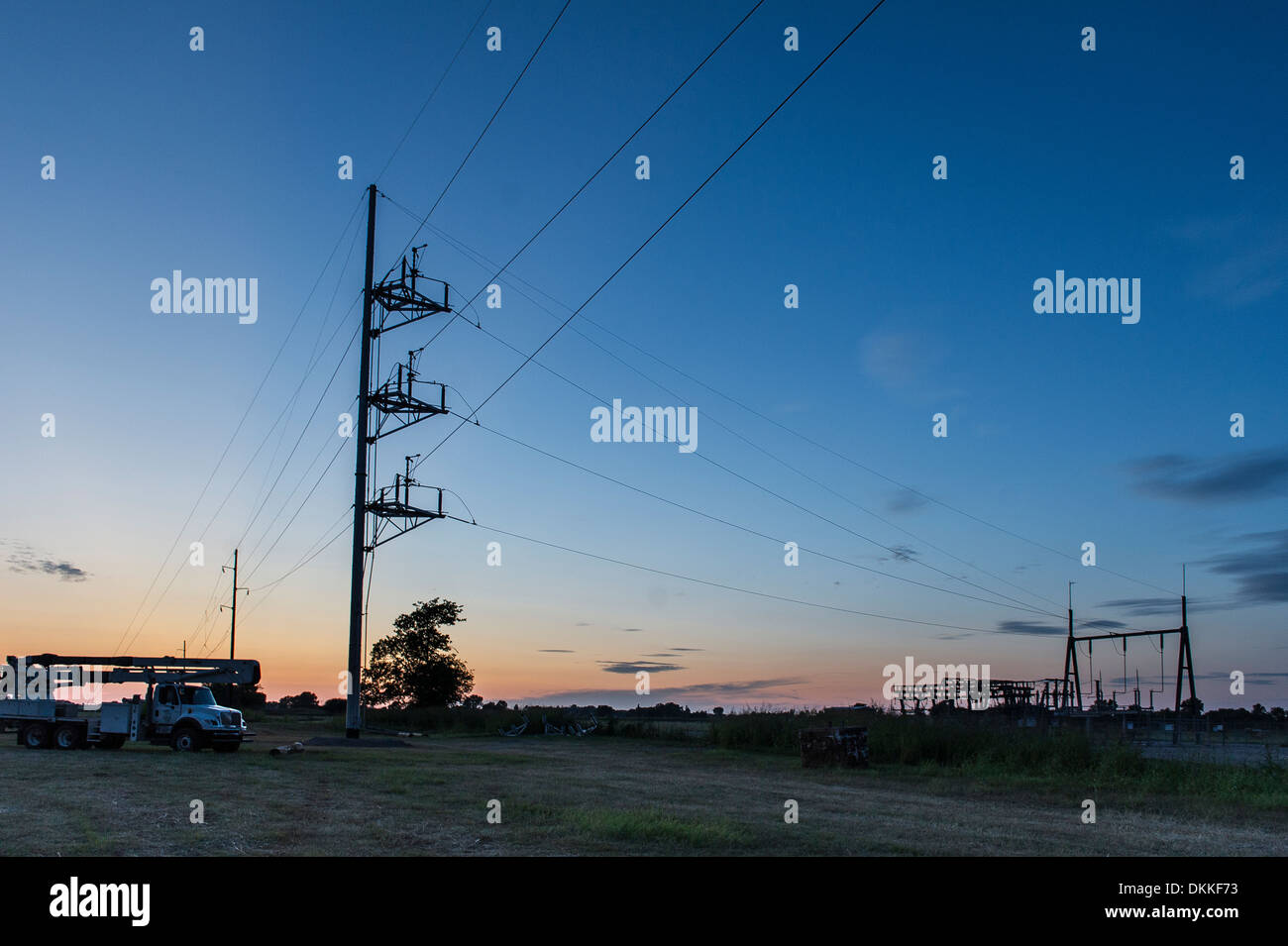 Western Farmer's Electric linemen work to repair a high voltage ...