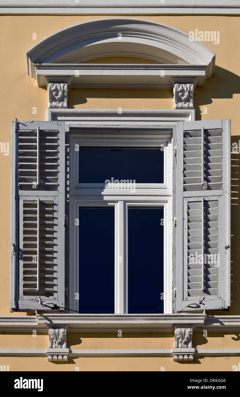 Detail of a window of an italian classical building Stock Photo - Alamy