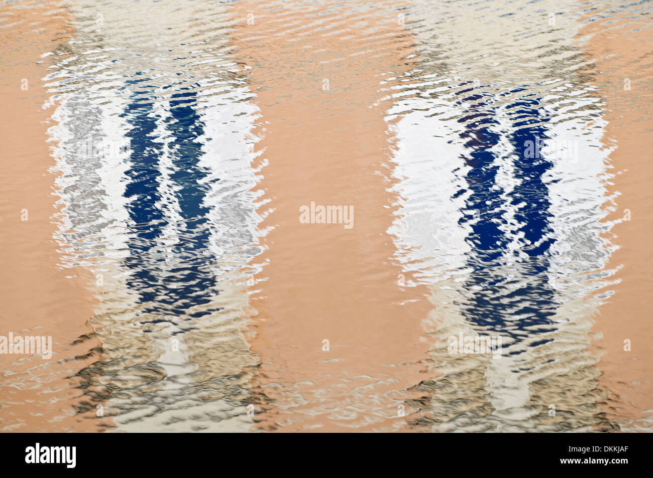 Windows of a building reflected into the water Stock Photo - Alamy
