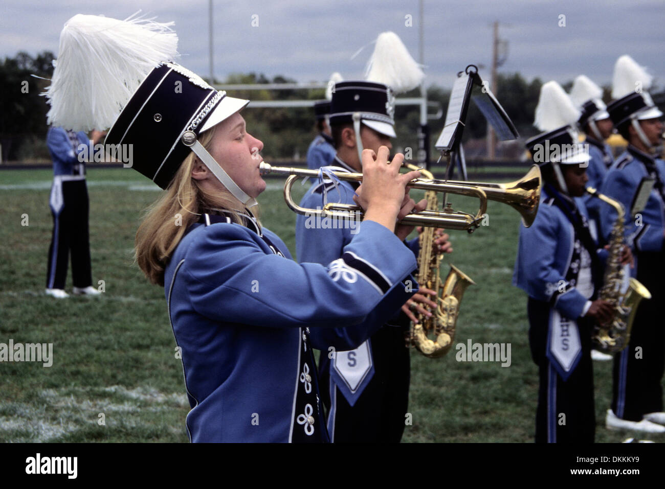 A member of the high school marching band giving the halftime show in ...