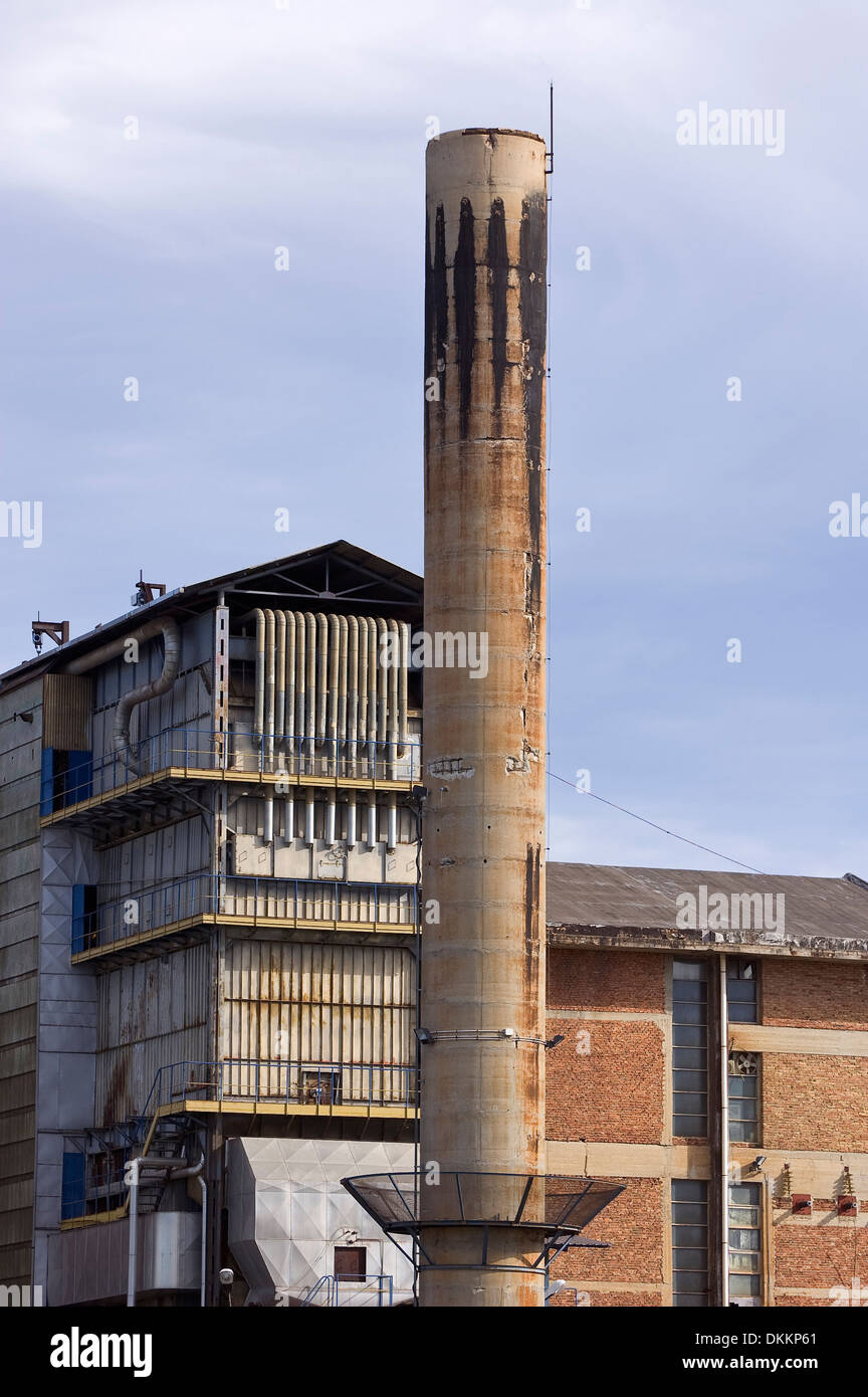 Detail of an industrial plant with chimney Stock Photo - Alamy