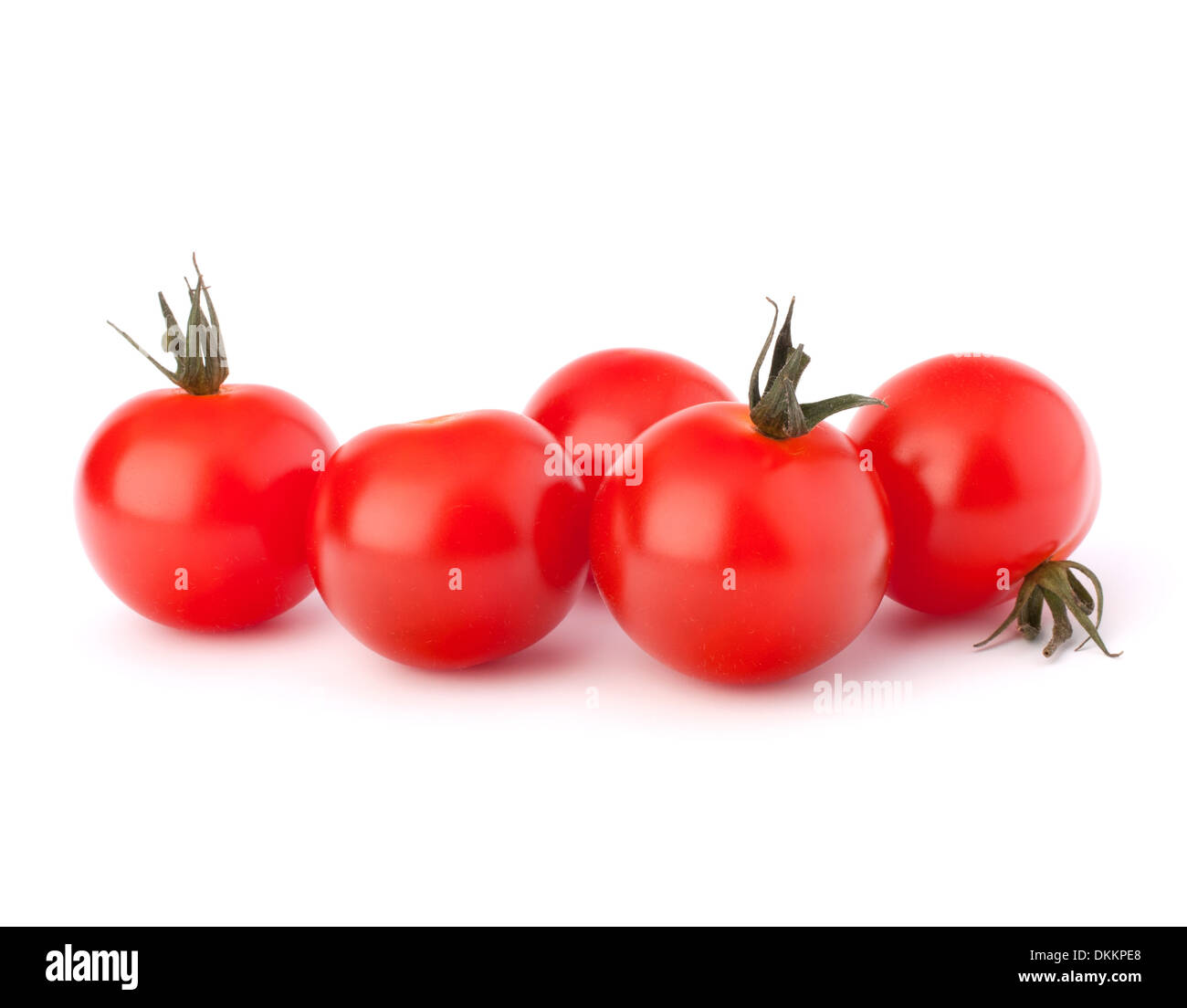 Small cherry tomato on white background close up Stock Photo - Alamy