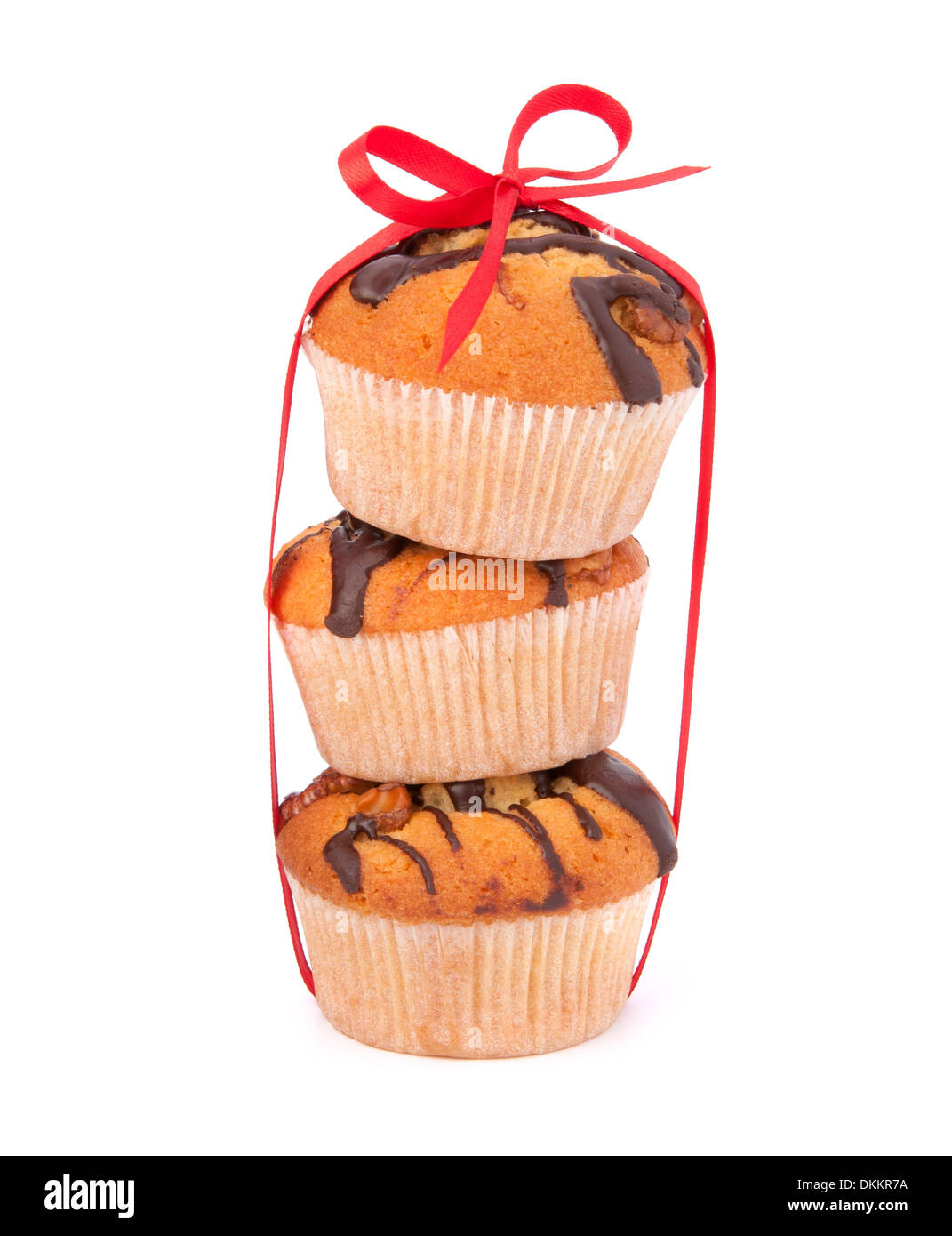 Stacked muffins isolated on white background Stock Photo - Alamy