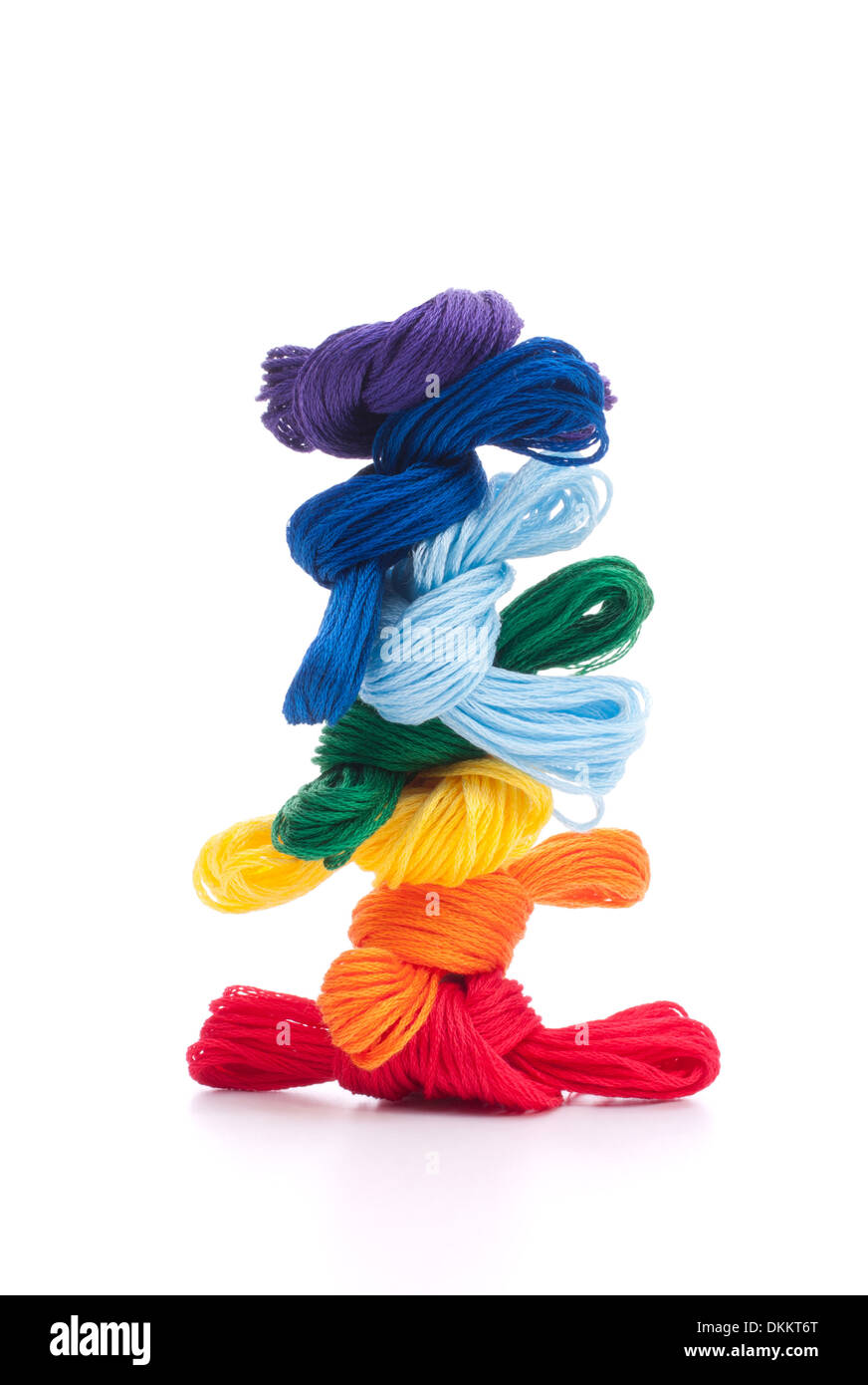 Color threads bunch isolated on white background cutout Stock Photo - Alamy