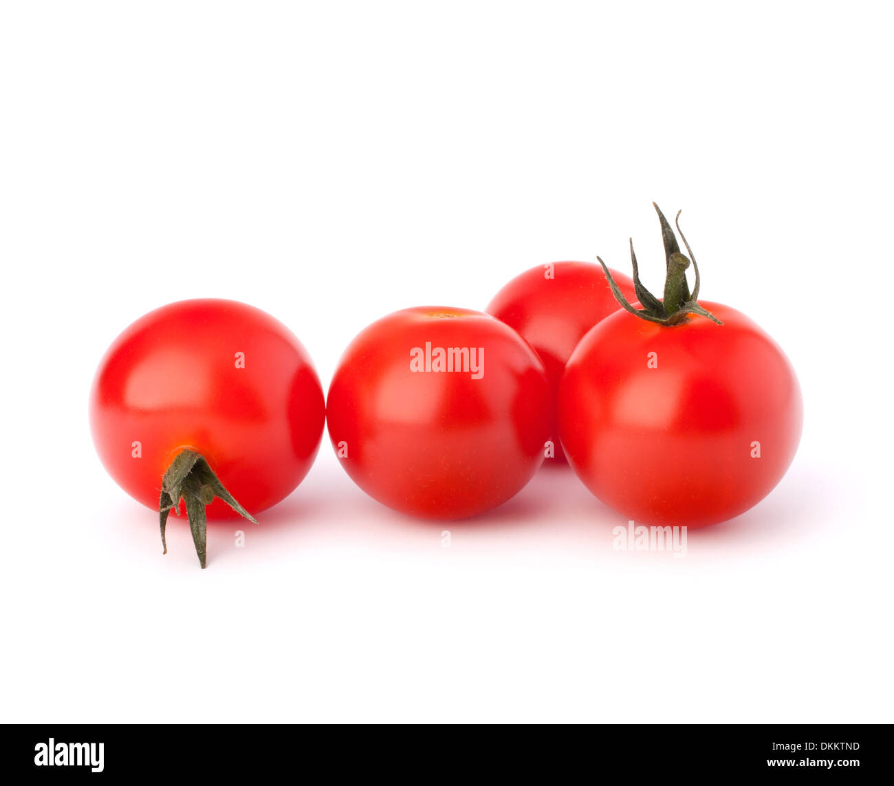 Small cherry tomato on white background close up Stock Photo - Alamy
