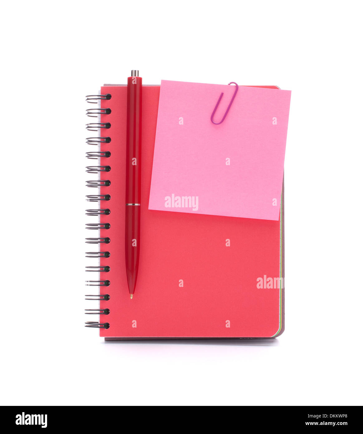 Red notebook with notice paper and pen isolated on white background ...