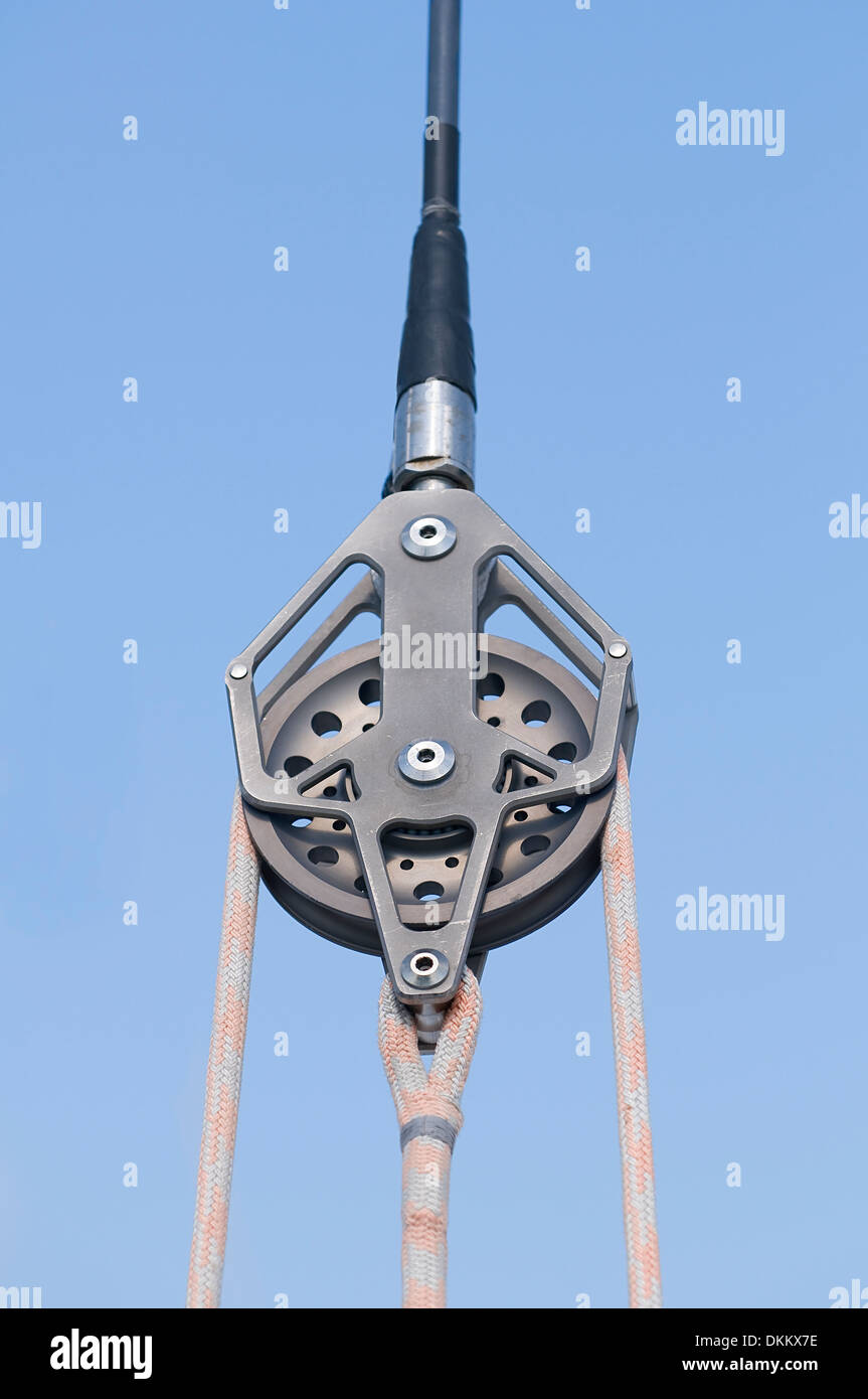 Block detail of a modern sailboat with rope Stock Photo - Alamy