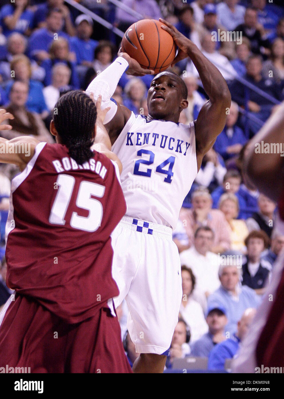 Kentucky's Eric Bledsoe drained a three pointer for three of his 11 ...