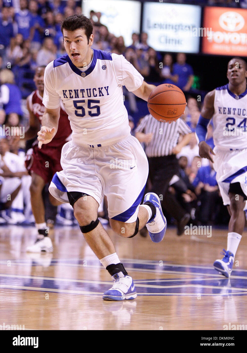 Kentucky's Josh Harrellson drove the length of the floor and got fouled ...