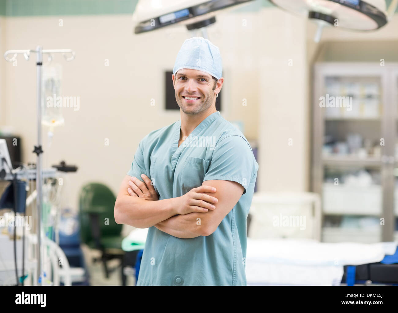 Surgeon Standing Arms Crossed In Operation Room Stock Photo - Alamy