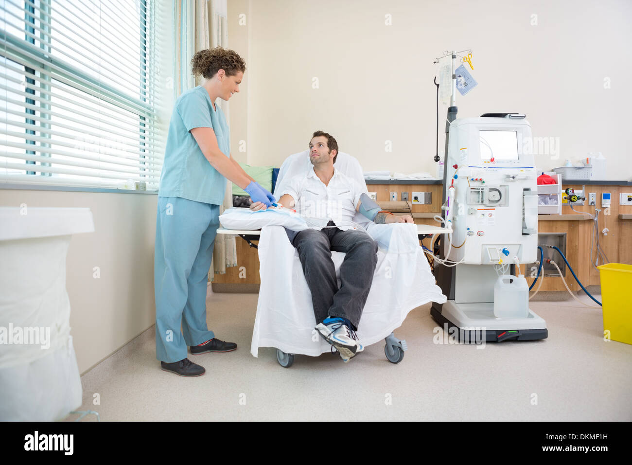 Nurse and Patient on Renal Ward Stock Photo - Alamy