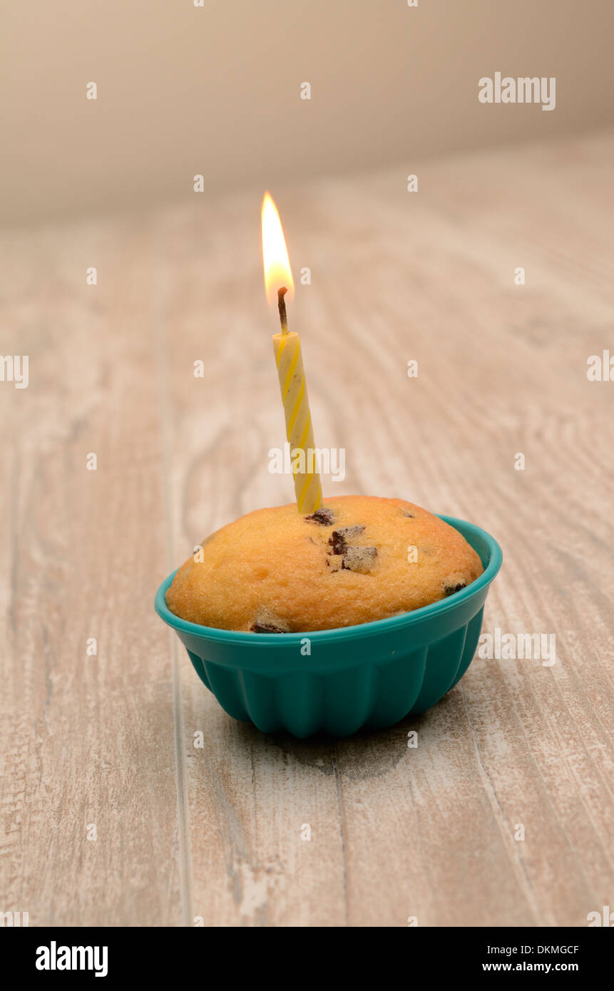 Birthday cake with one candle light Stock Photo - Alamy