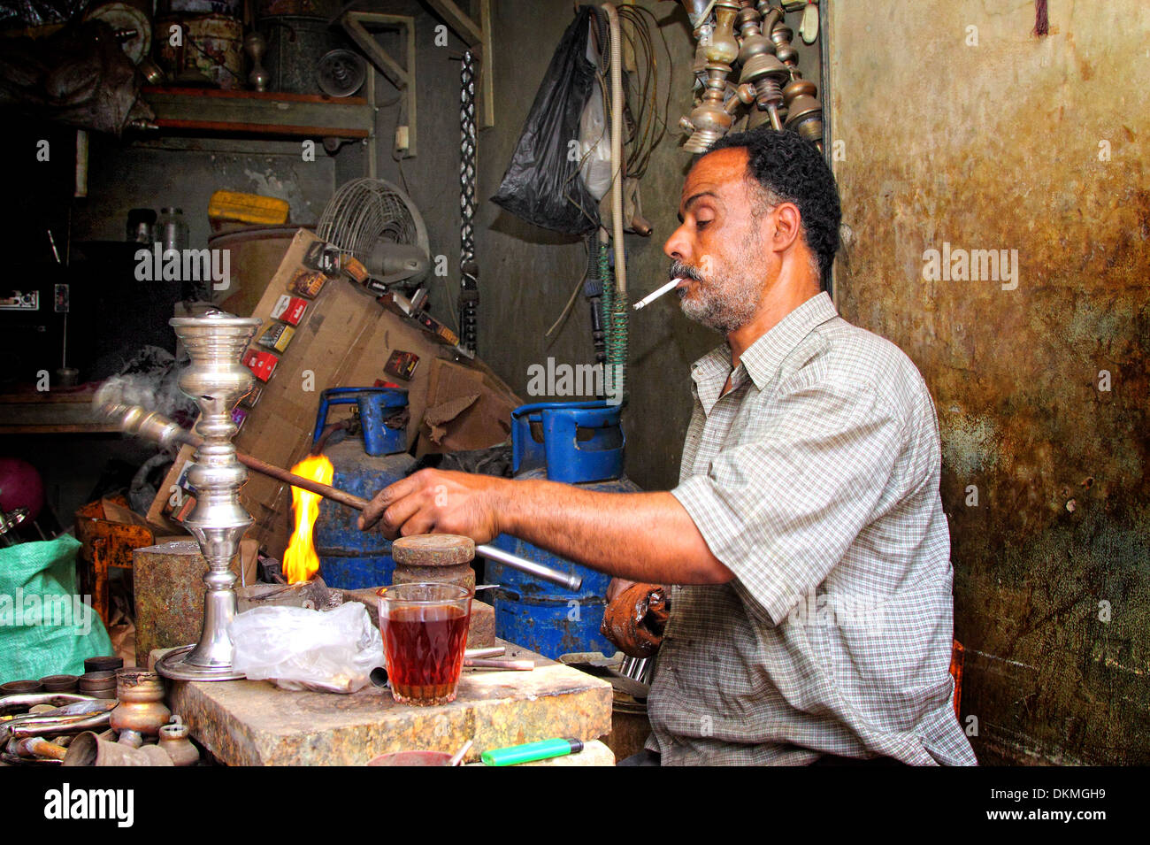 The Shisha Maker (hukka maker ) @ old Cairo Stock Photo - Alamy