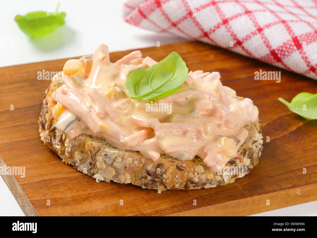 Slice of whole grain bread with ham salad Stock Photo - Alamy