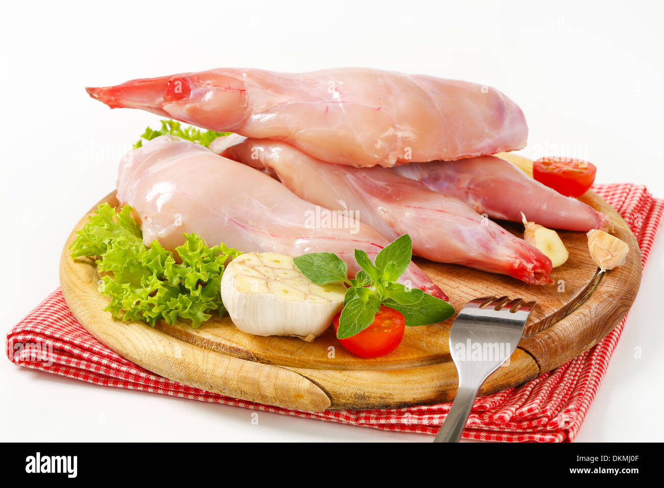 Fresh rabbit meat on cutting board Stock Photo - Alamy