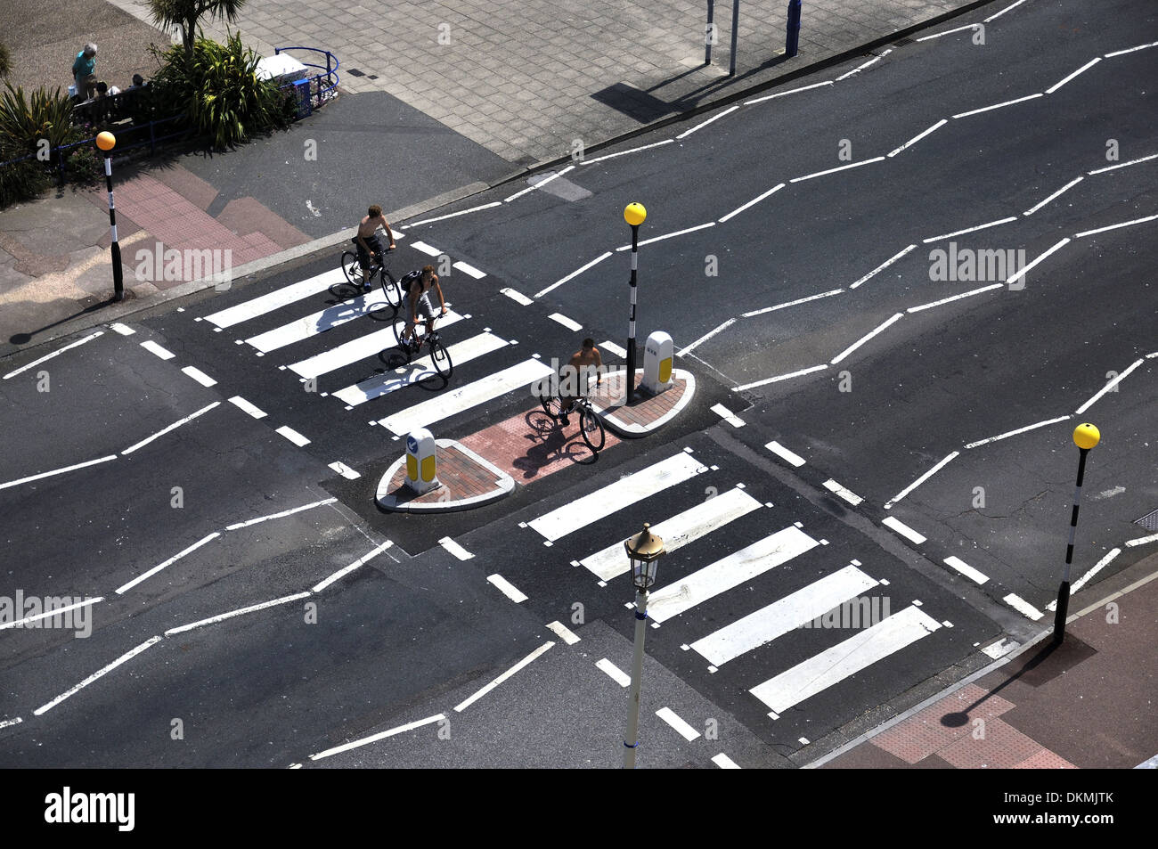 Overhead shot of zebra crossing on Eastbourne sea front being used by ...