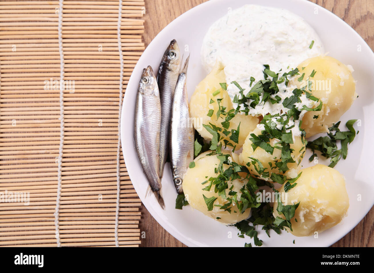 potato and small fish Stock Photo - Alamy