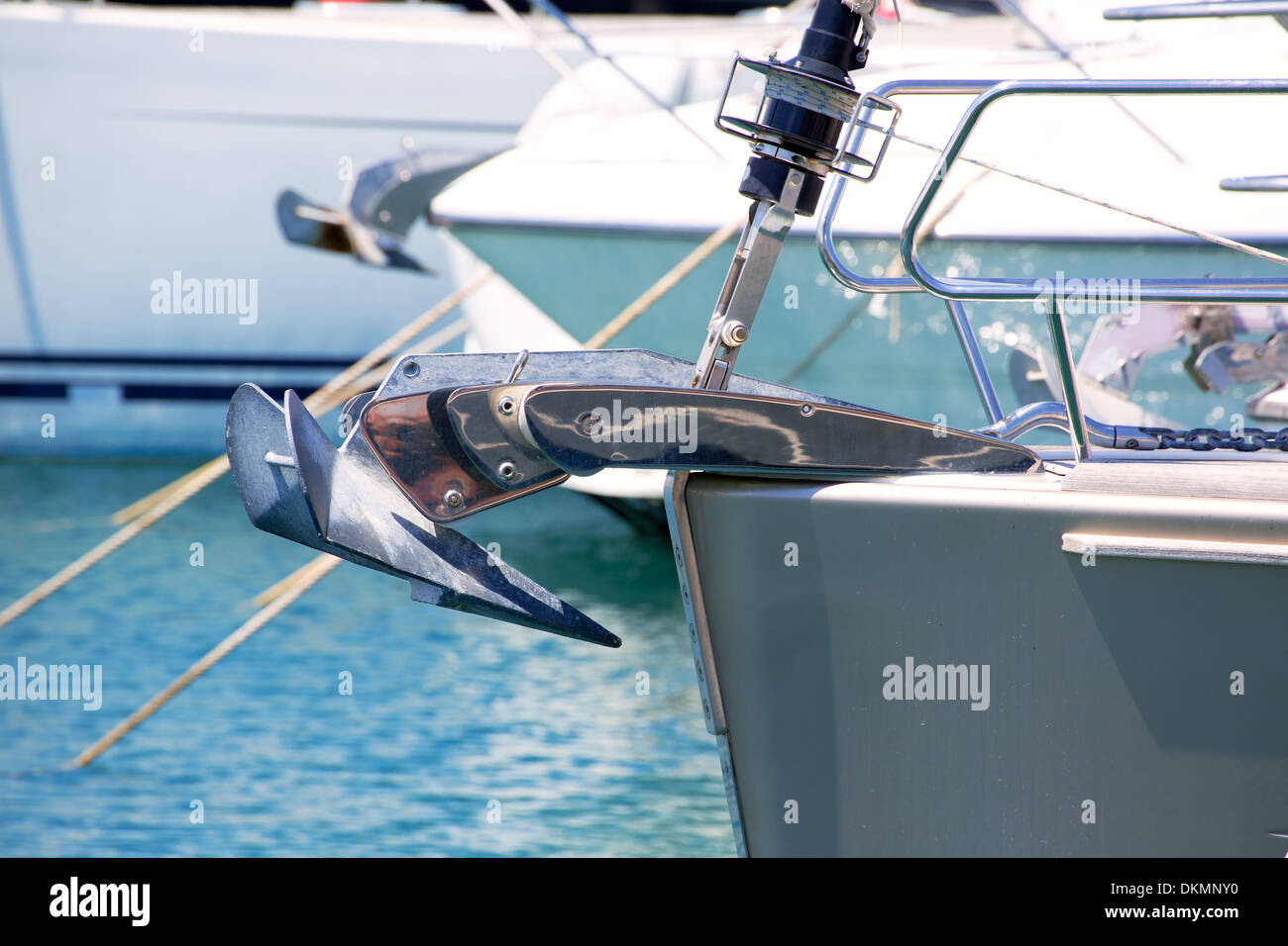 Boat bow with Anchor detail of sailboats in a row at Mediterranean sea ...
