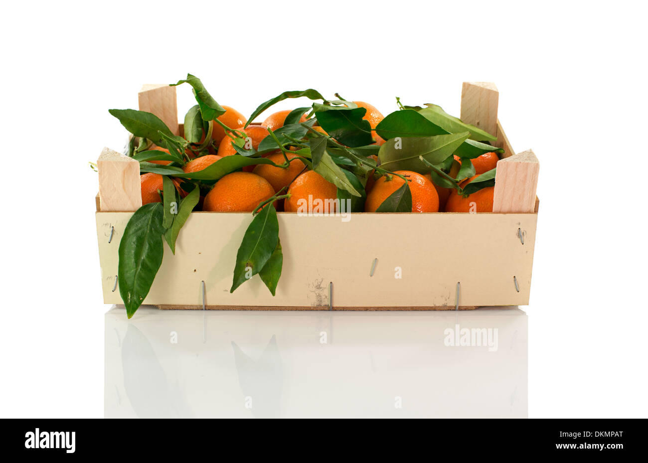 wooden box with mandarines isolated on white Stock Photo - Alamy