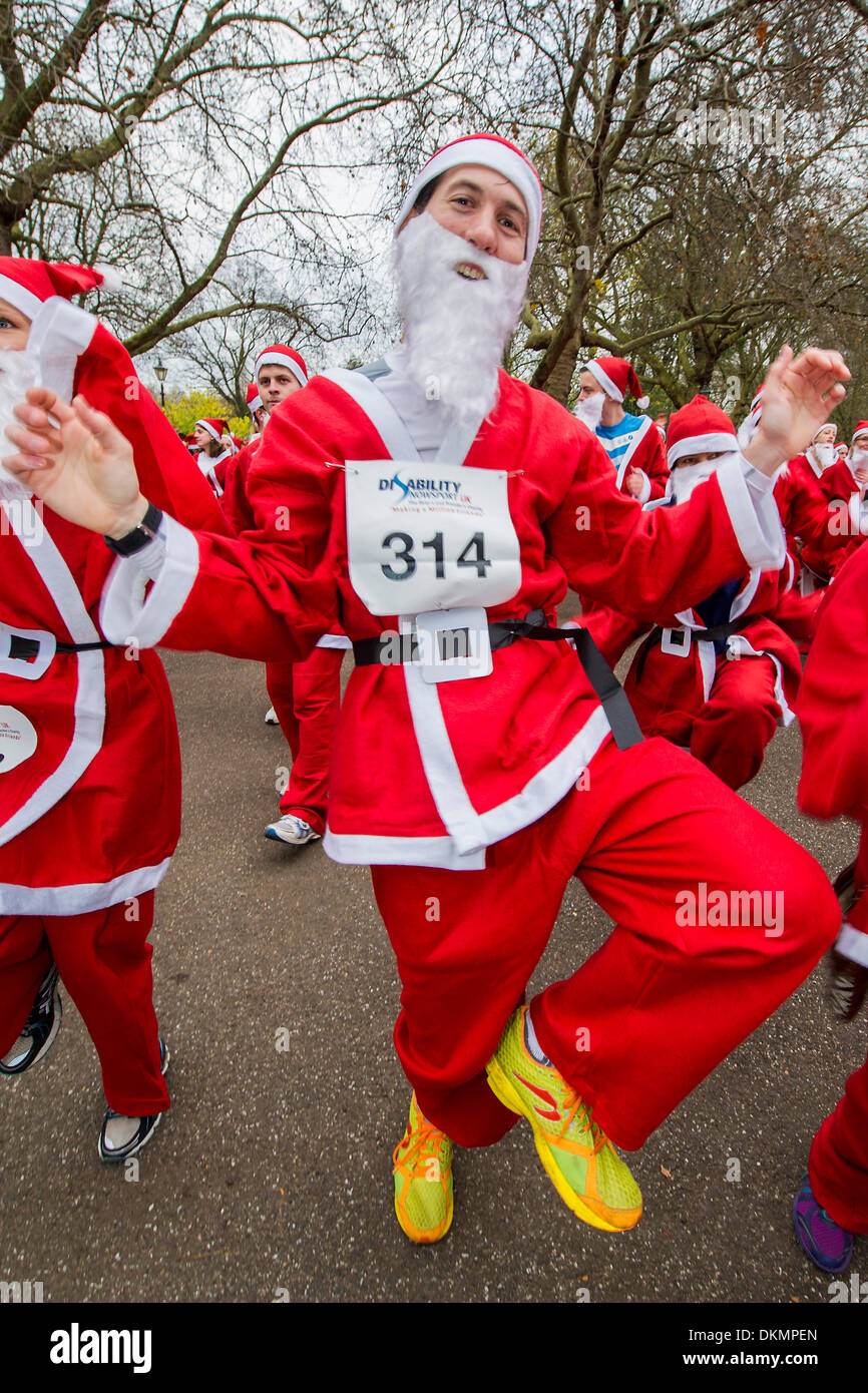 London, UK. 07th Dec, 2013. The pre run warm up for The London Santa ...