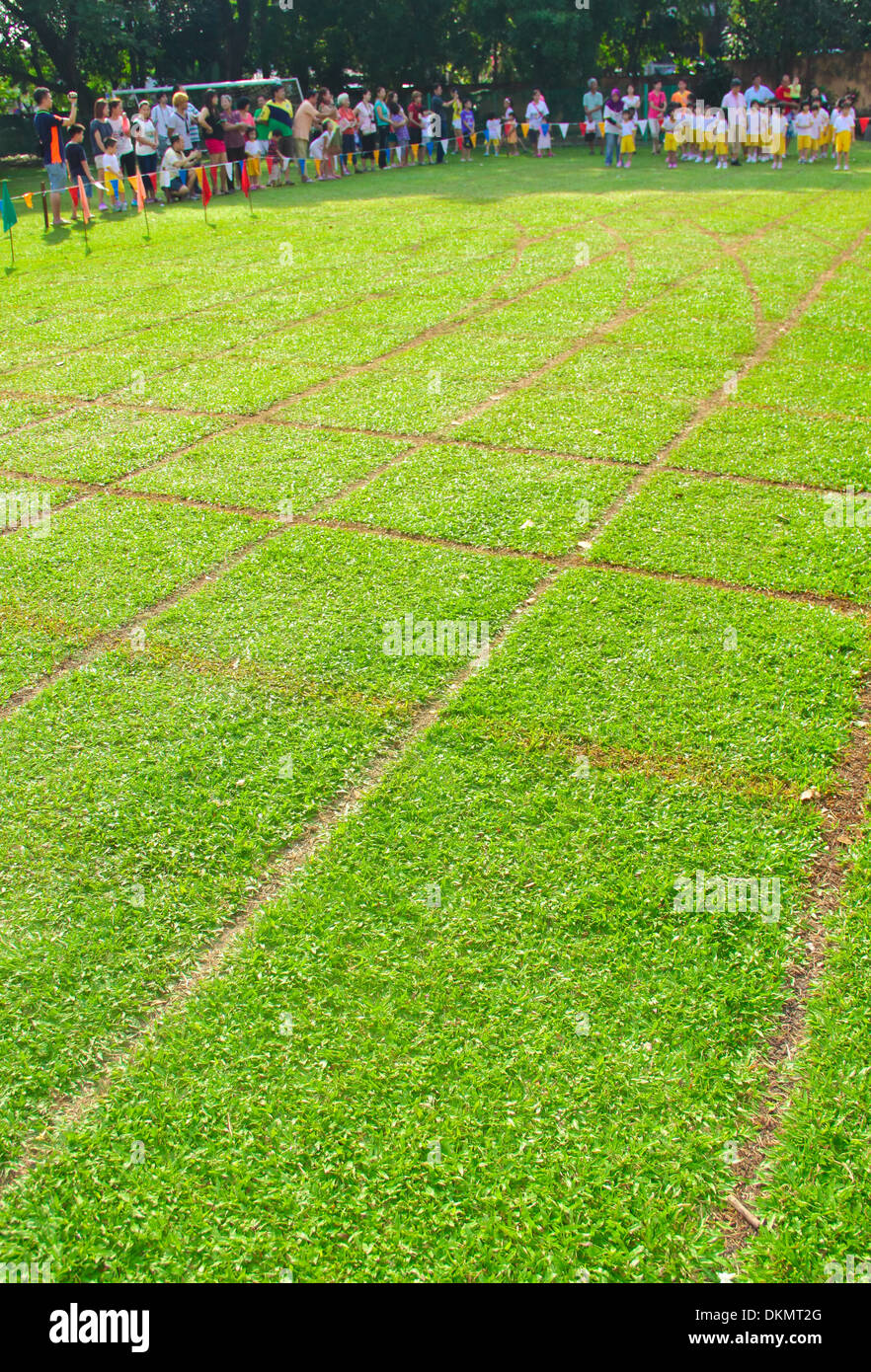 Activity on school play field Stock Photo - Alamy