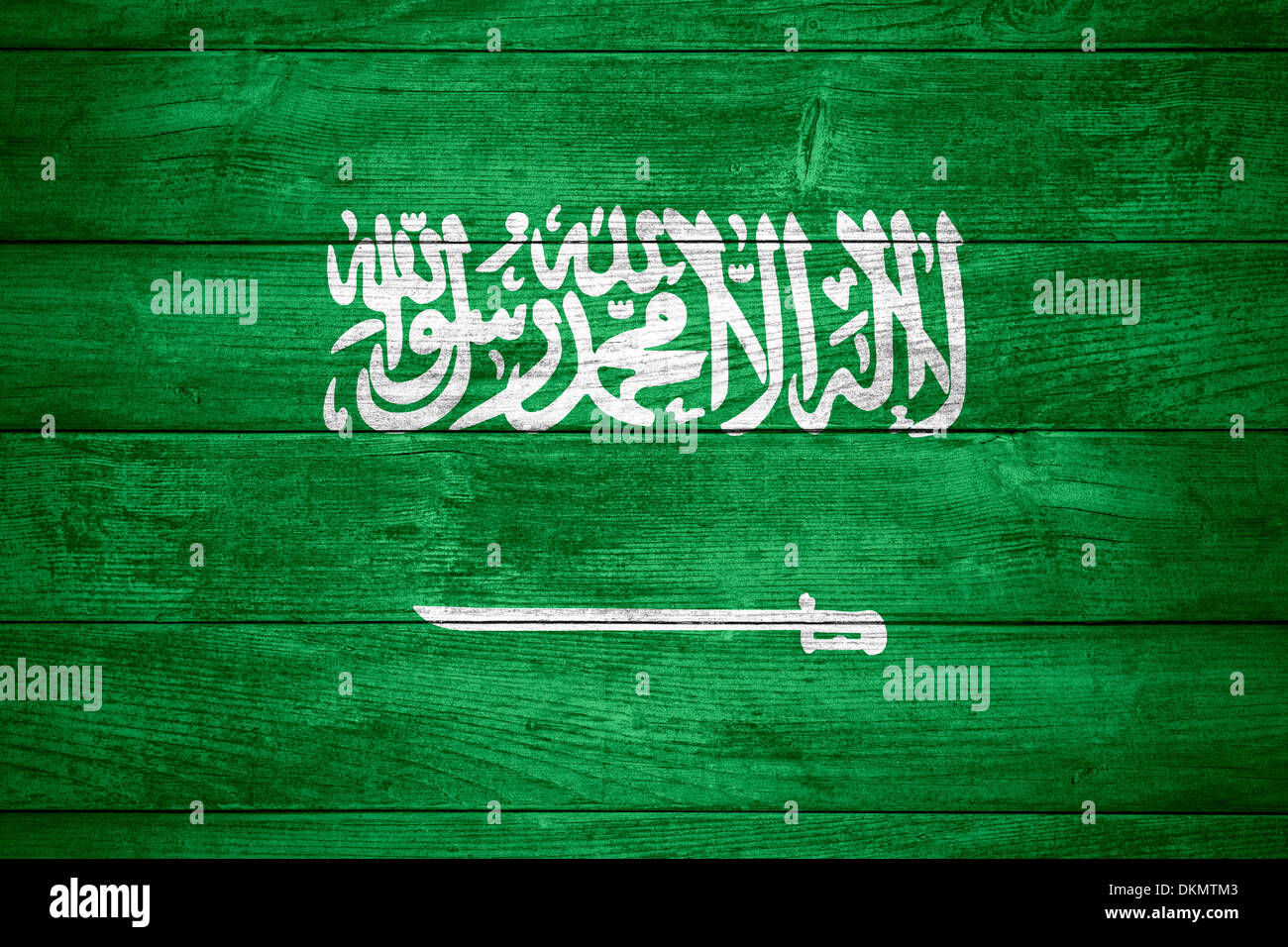 flag of Saudi Arabia or banner on wooden background Stock Photo - Alamy