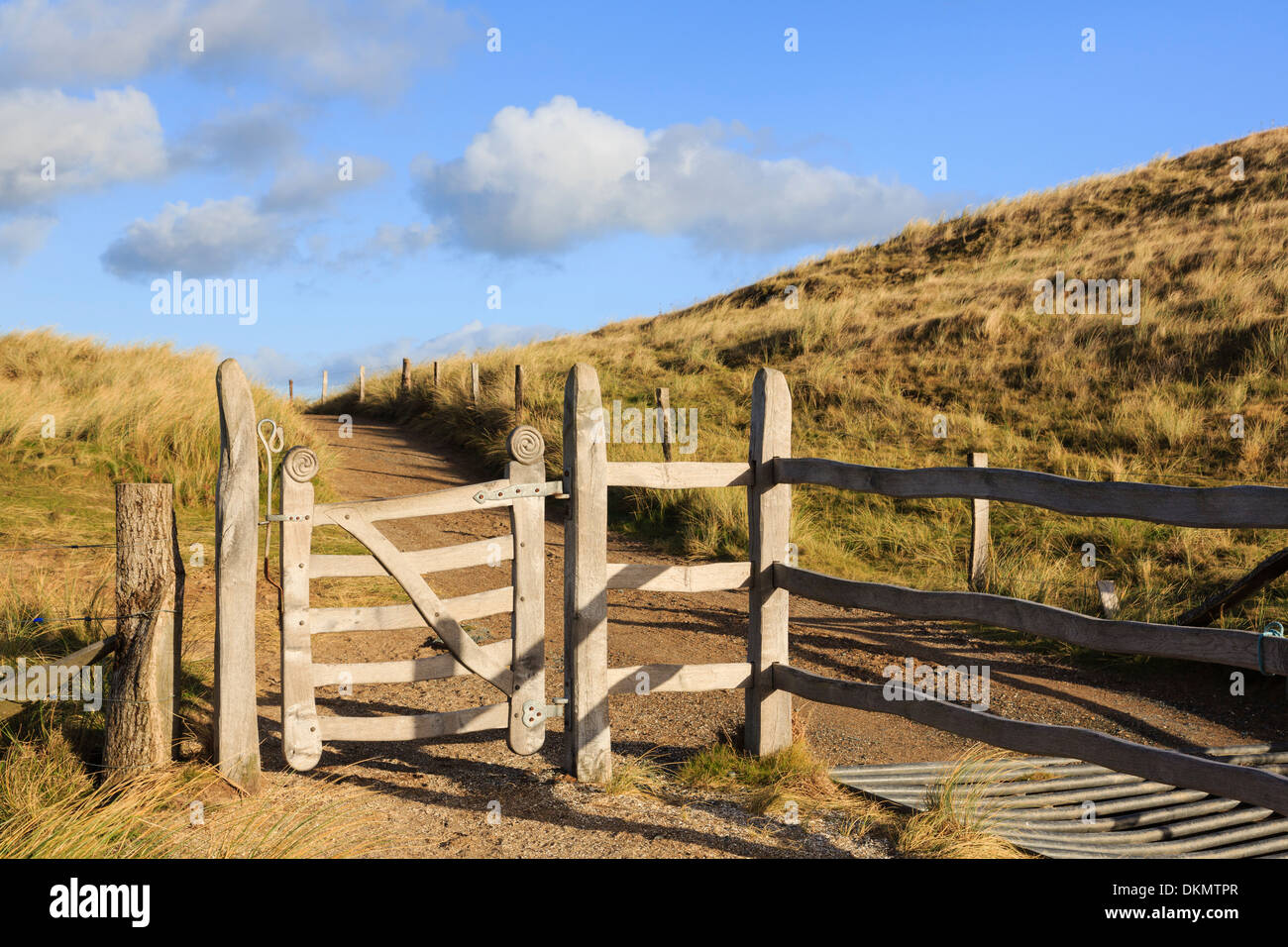 Ornamental gate beside cattle grid on main path on Ynys Llanddwyn ...