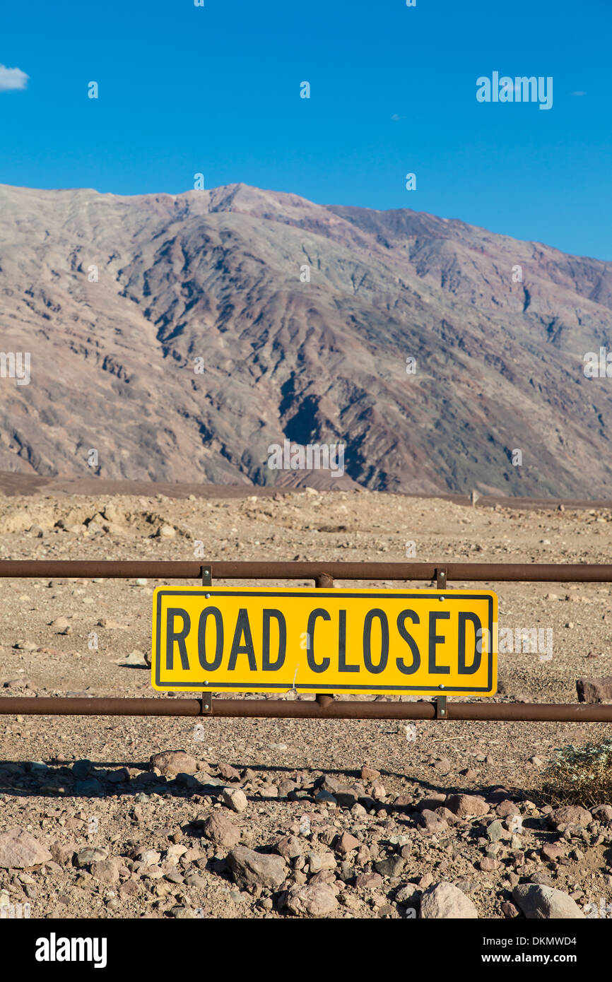 Death Valley, California. Road Closed sign in the middle of the desert ...