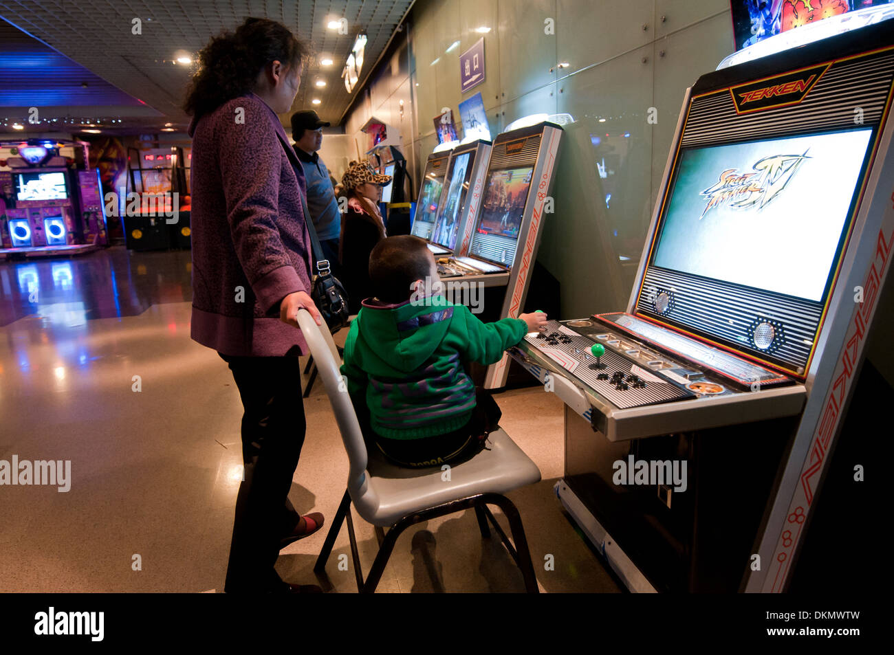 People playing arcade games in arcade china hi-res stock photography ...
