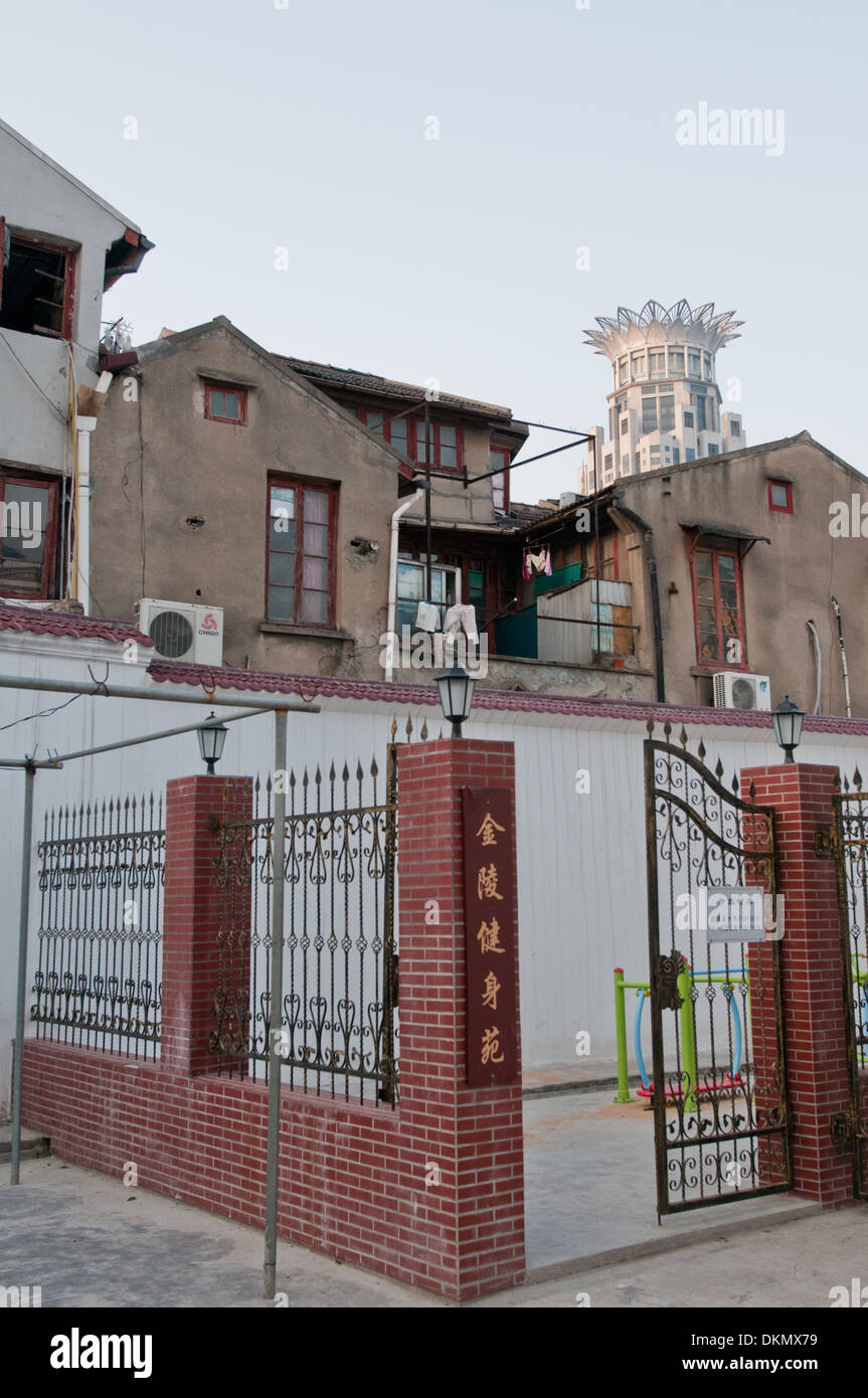 Houses next to busy Renmin Road in old part of Shanghai, China. Bund ...