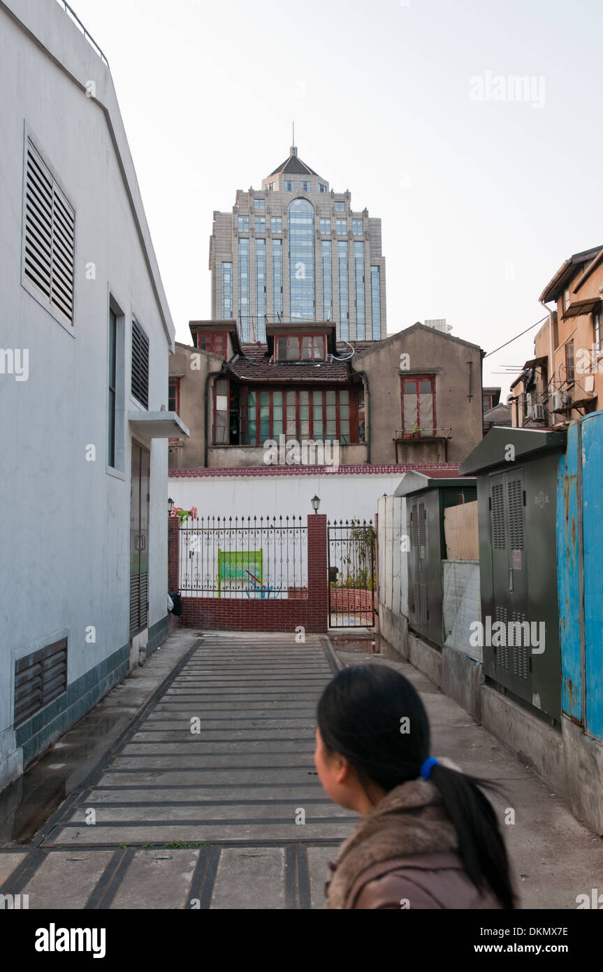 Houses next to busy Renmin Road in Shanghai, China. Wangjiao Plaza on ...