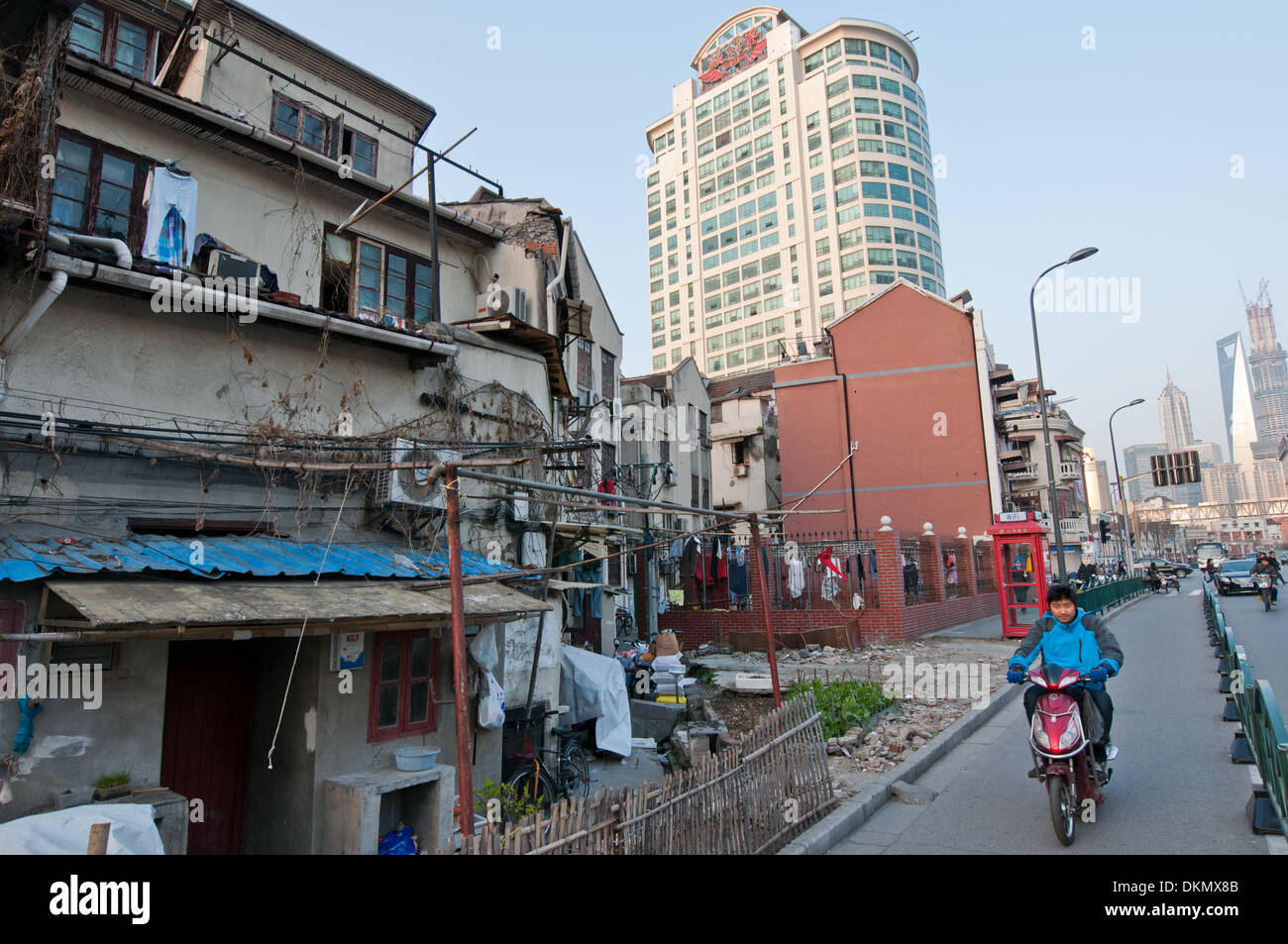 Houses next to busy Renmin Road in old part of Shanghai, China. Houses ...