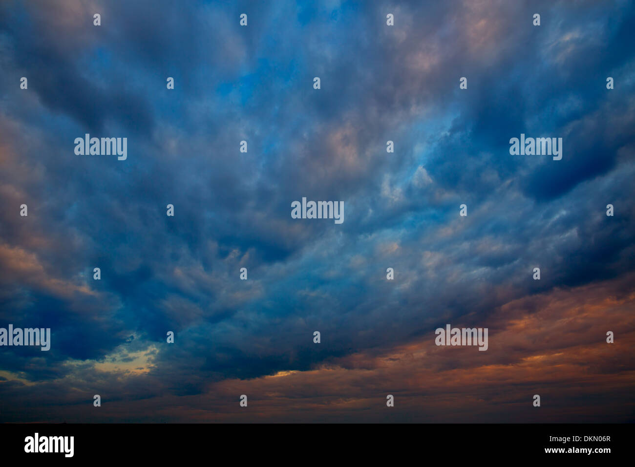 Dramatic sky with stormy clouds in sunset sunrise Stock Photo - Alamy