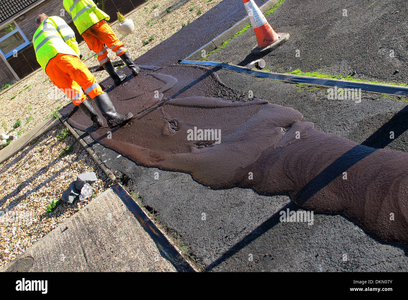 Slurry seal preocess hi-res stock photography and images - Alamy