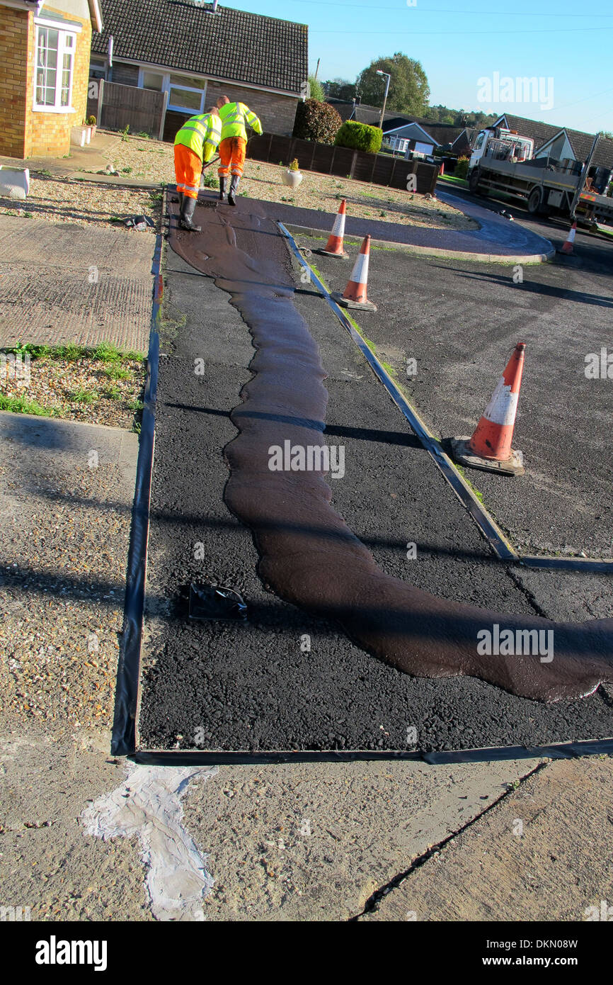 Slurry seal process hi-res stock photography and images - Alamy