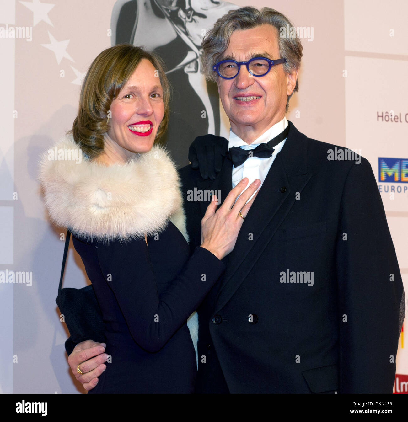 Berlin, Germany. 07th Dec, 2013. Director Wim Wender (R) and his wife ...