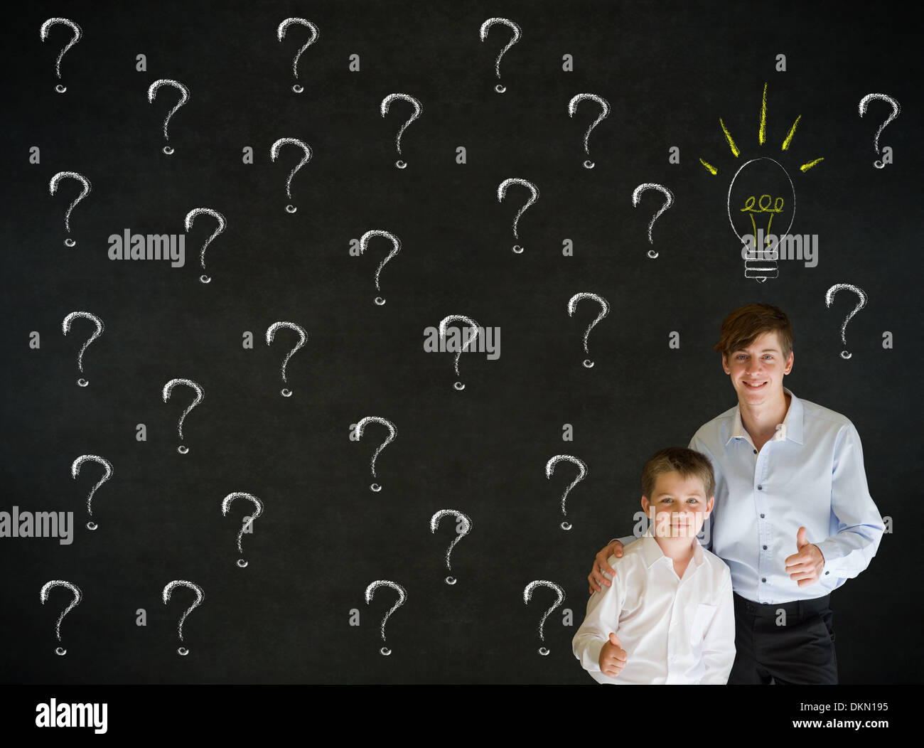 Thinking boy and Businessman/Teacher questioning ideas on blackboard ...