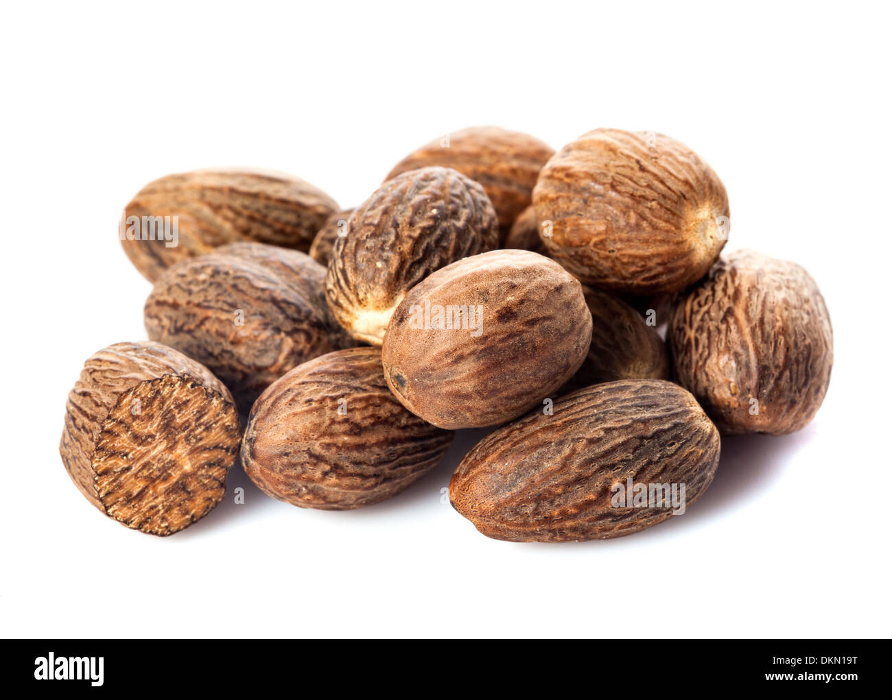 Dry nutmeg spice isolated on white backgsound Stock Photo - Alamy